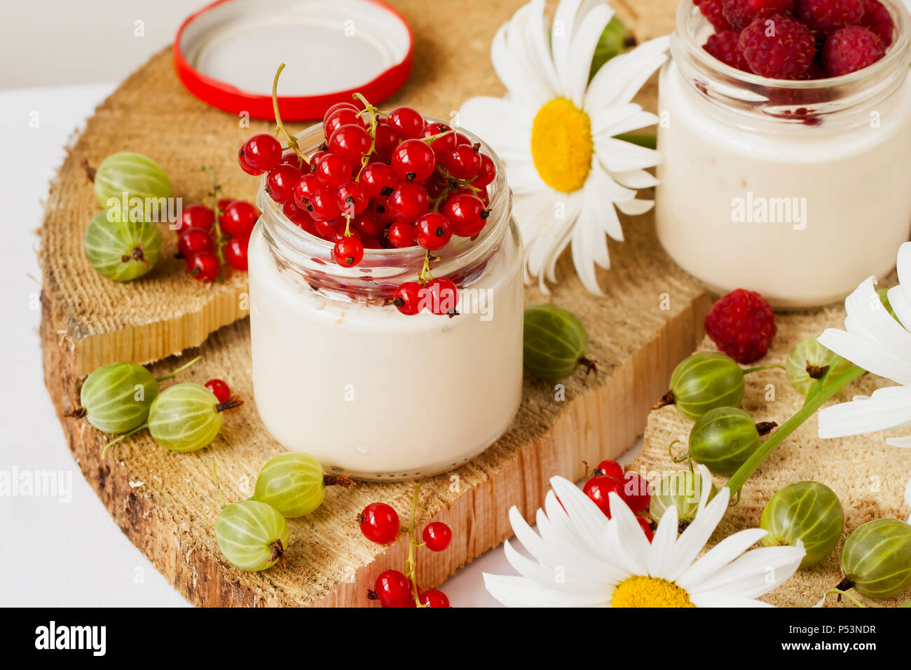Morning dessert with yogurt, granola, berries Stock Photo - Alamy