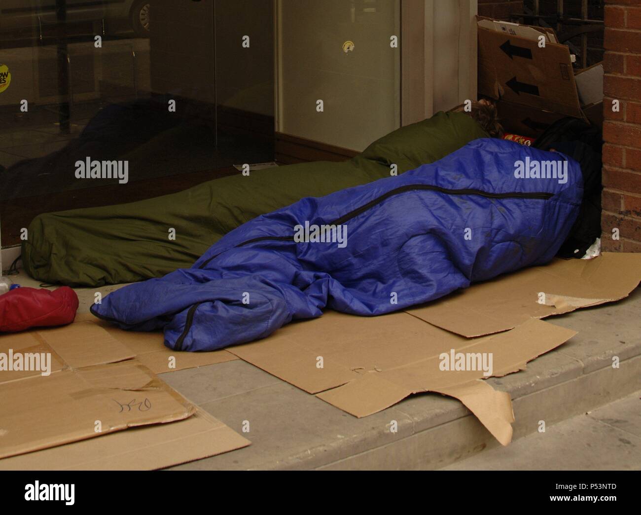 Homeless sleeping in cardboard box hi-res stock photography and images ...