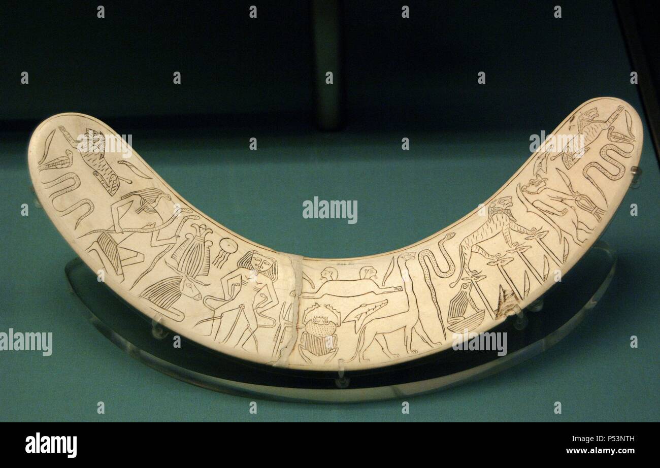 Magical wand of ivory of hippopotamus tusk with images depicting ...
