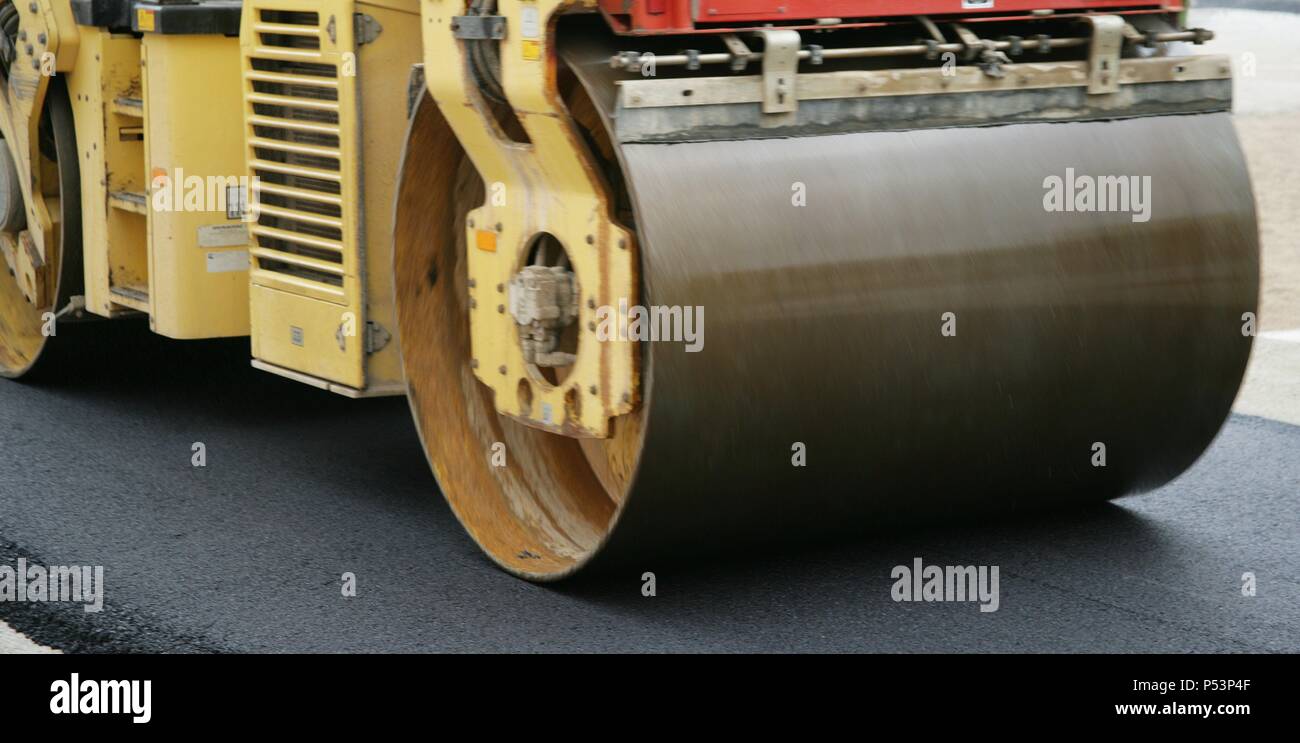 Road roller on asphalt pavement works. Barcelona. Spain Stock Photo - Alamy