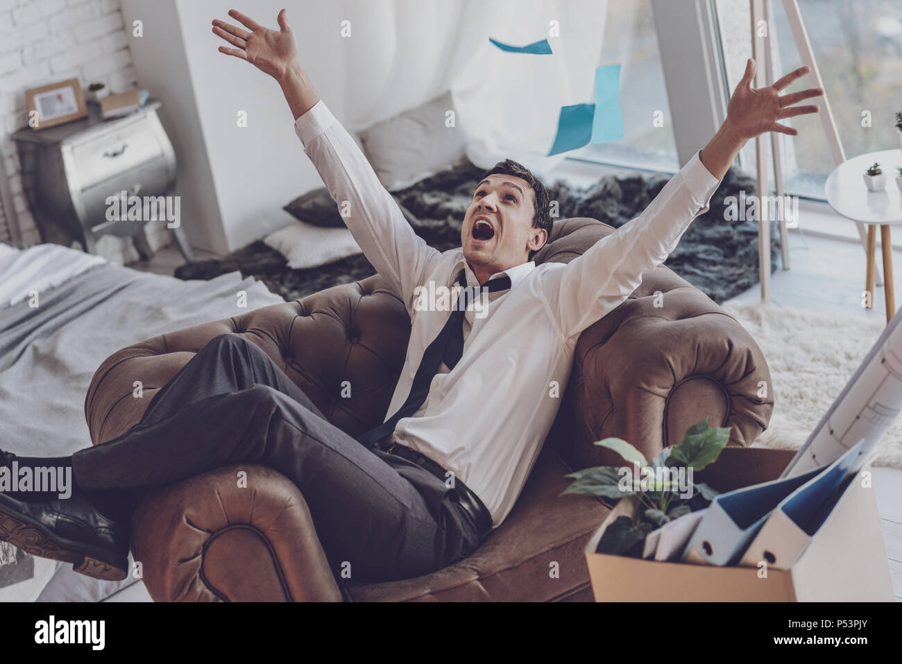 Joyful positive man expressing his emotions Stock Photo - Alamy Joyful positive man expressing his emotions Stock Photo - Alamy