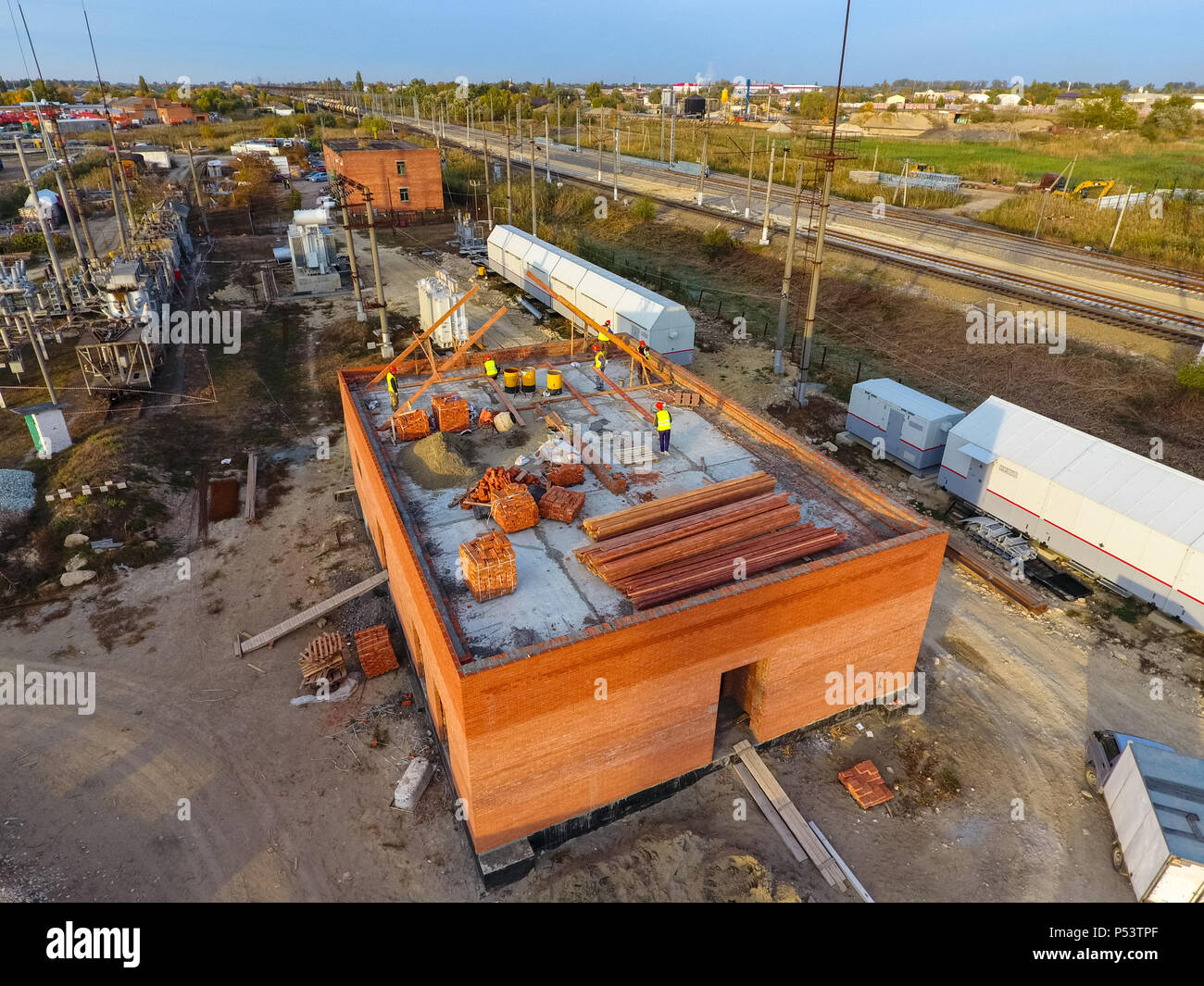 Construction of a brick building. Installation of the roof ...