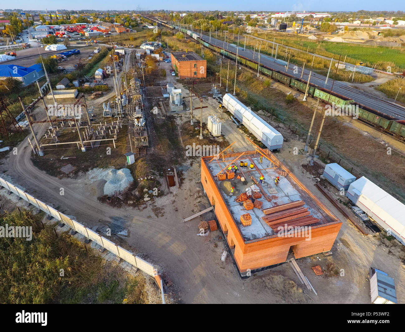 Construction of a brick building. Installation of the roof ...
