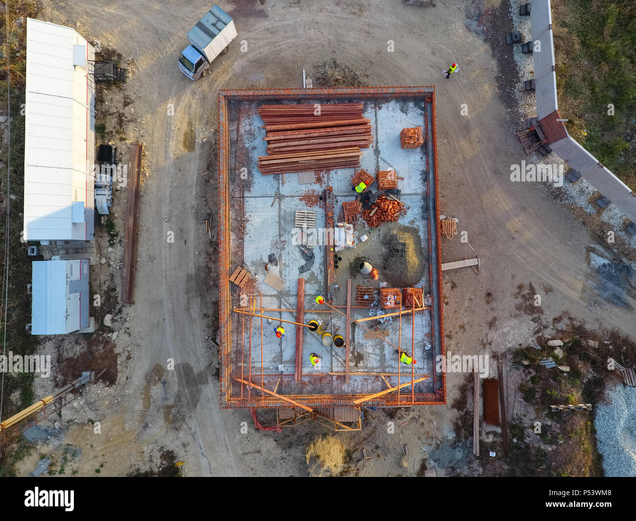 Construction of a brick building. Installation of the roof ...