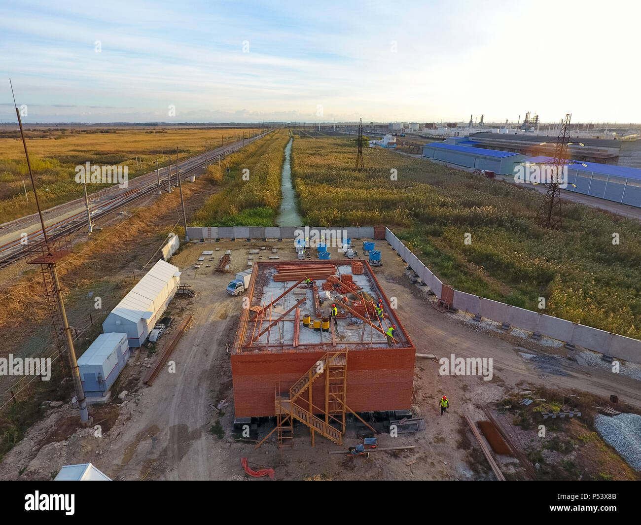 Construction of a brick building. Installation of the roof ...