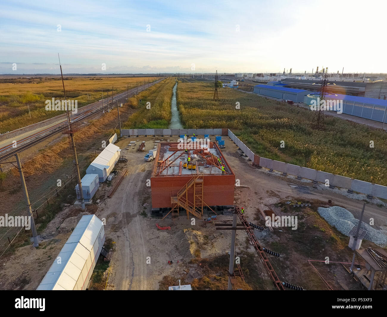 Construction of a brick building. Installation of the roof ...