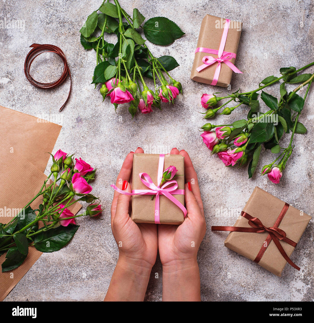Hold a gift hi-res stock photography and images - Alamy