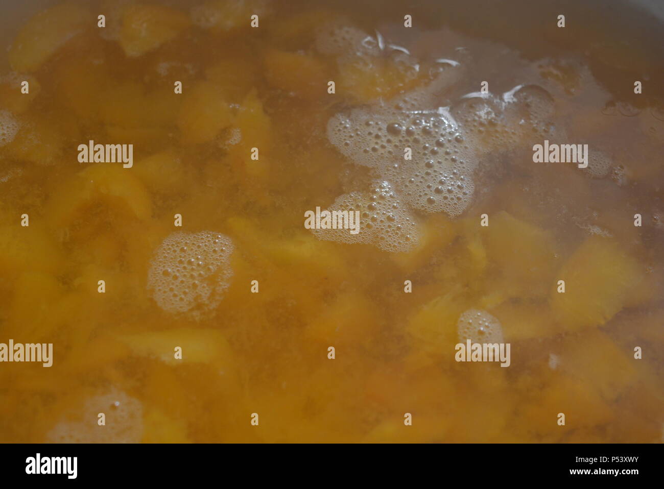 Food, cooking homemade meals, boiled peach slices, peach compote ...