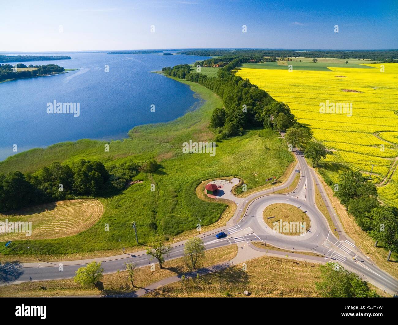 Aerial view of roundabout circle and bike lanes near Wegorzewo town ...