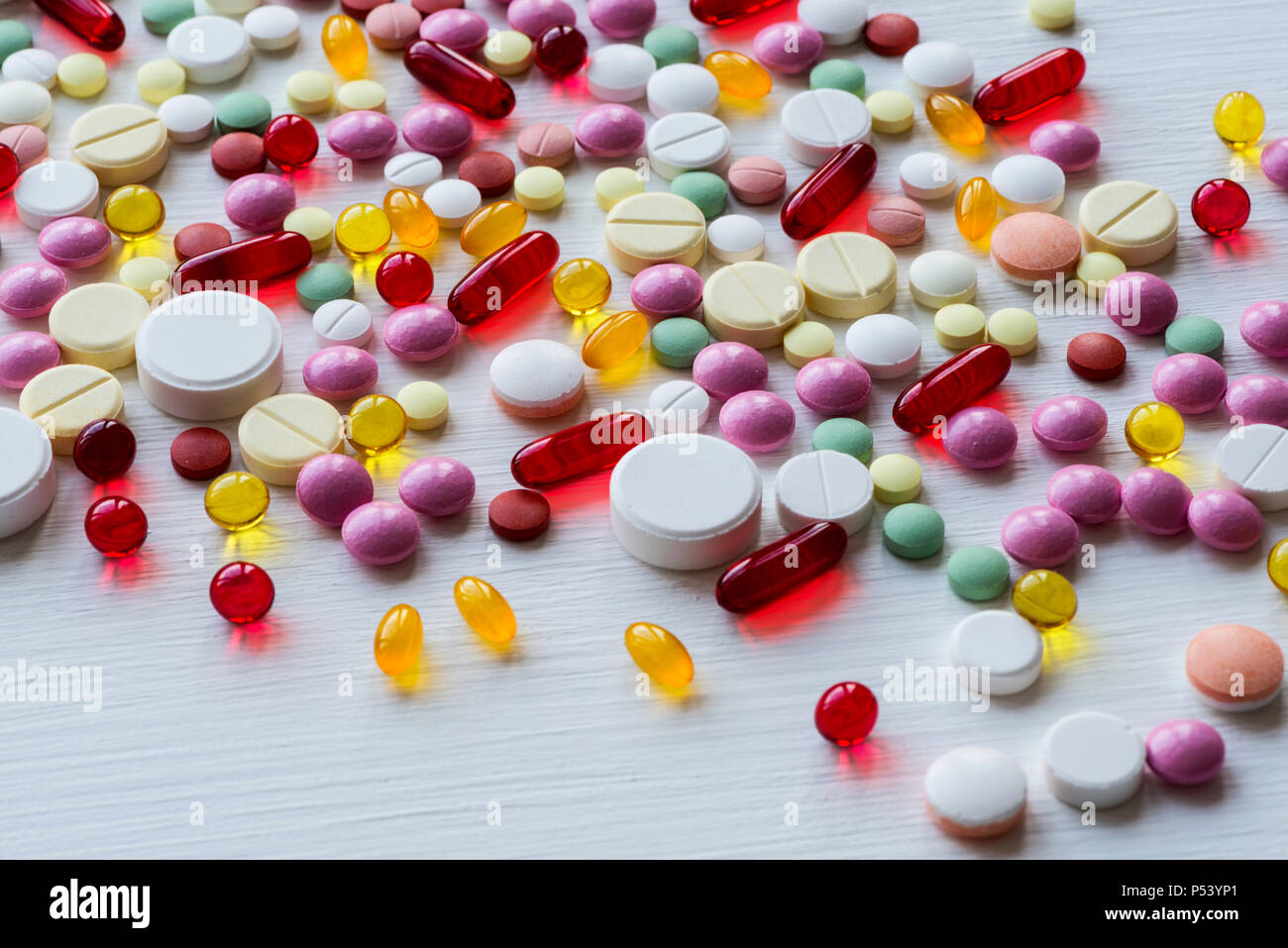 Many colorful medicines. Pills and capsules on white background Stock ...