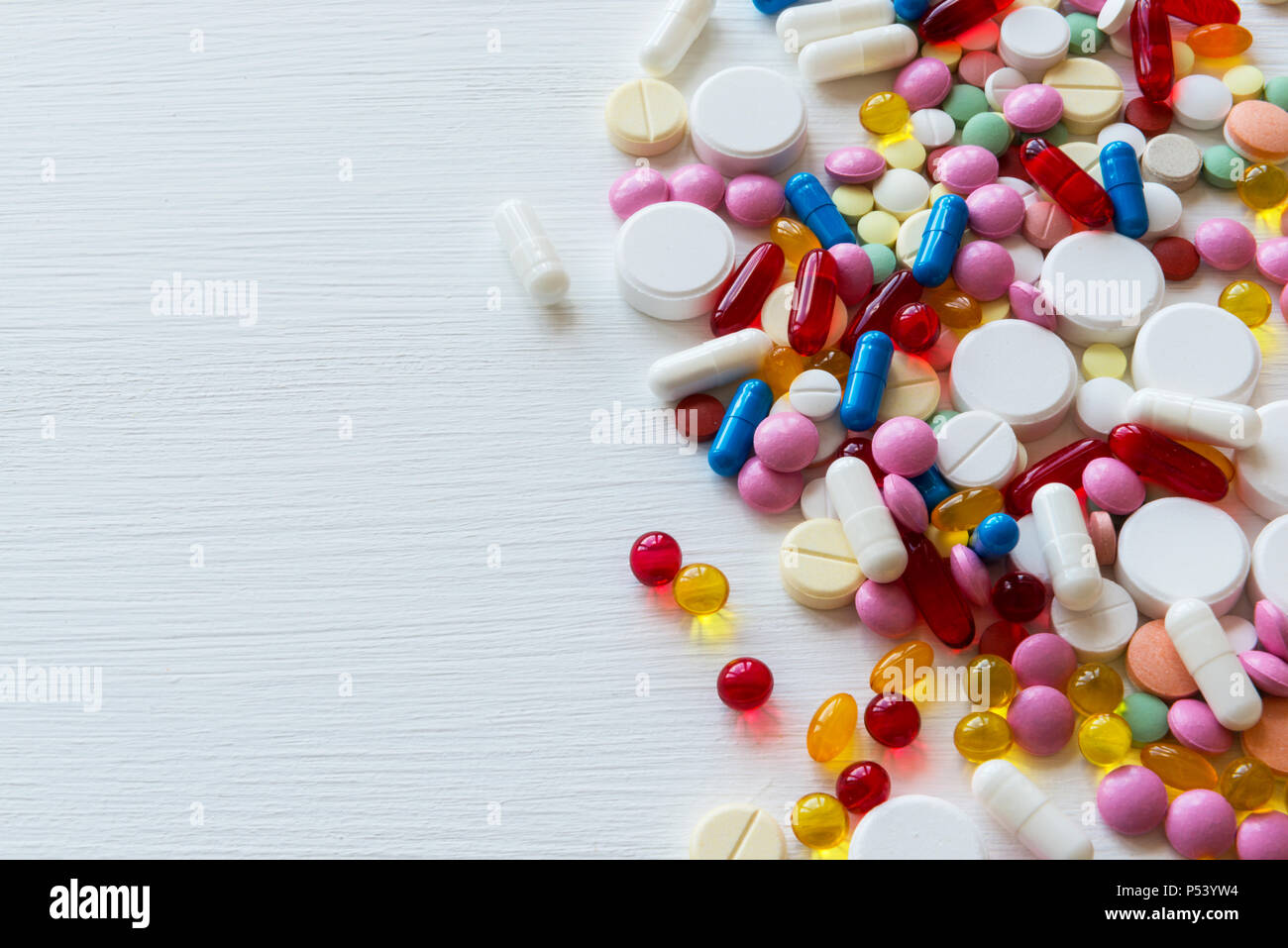 Many colorful medicines. Pills and capsules on white background Stock ...