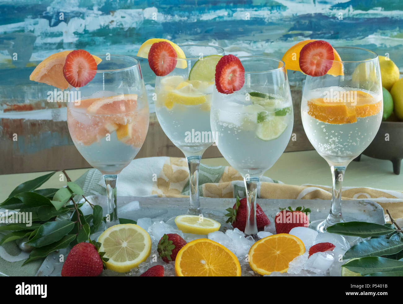 Refresh your thirst in style-sparkling water garnished with fresh fruit ...