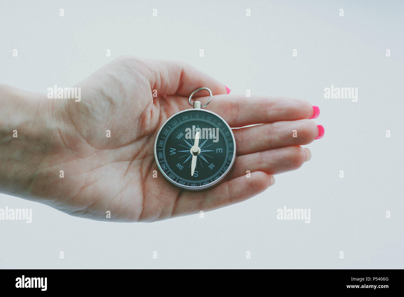 Girl map compass hi-res stock photography and images - Alamy