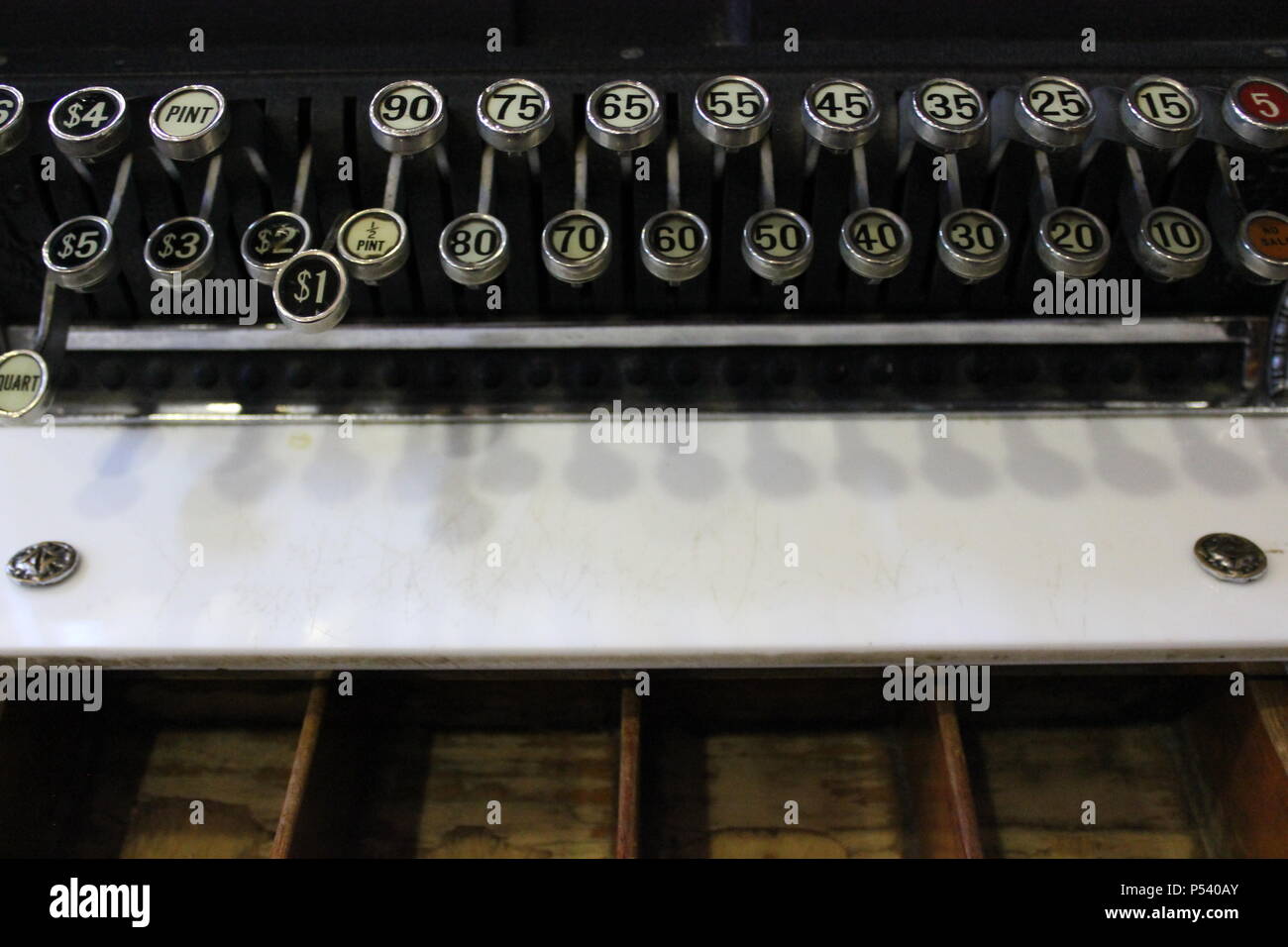 Old vintage cash register with missing keys Stock Photo - Alamy