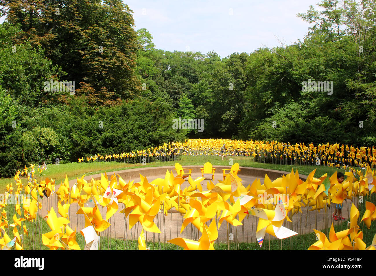NEW YORK, NY - JULY 10: Yellow pinwheels placed in Prospect Park's Rose ...