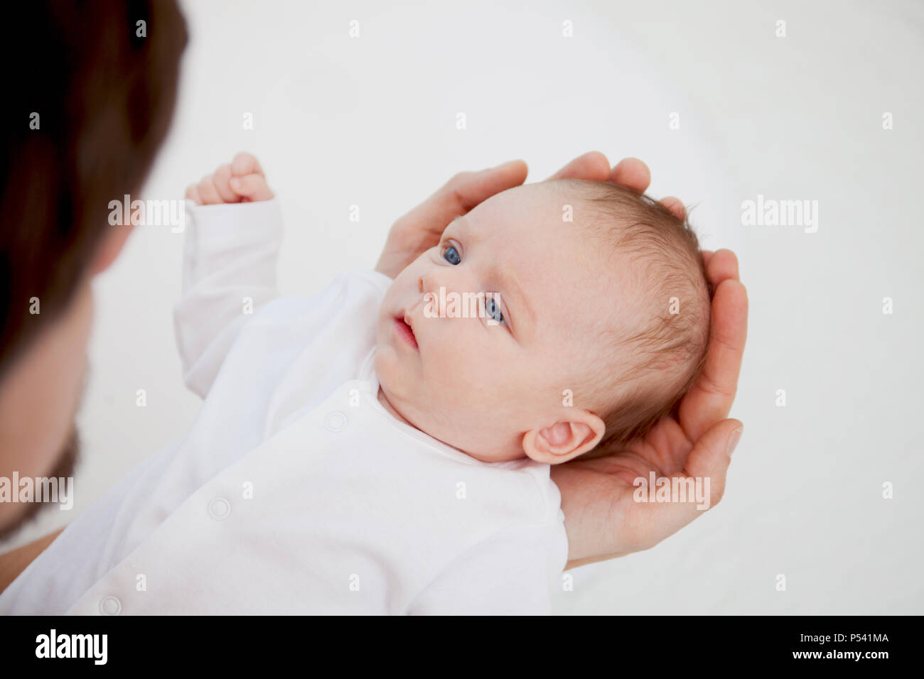 Woman holding new born baby in arms hi-res stock photography and images ...