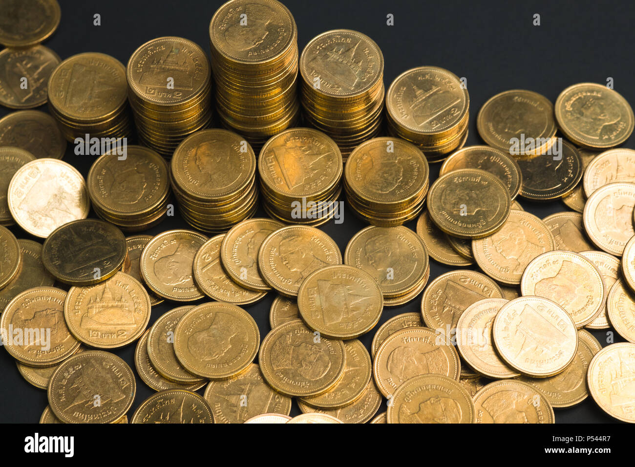 Savings, increasing columns of coins, piles of coins arranged as a ...