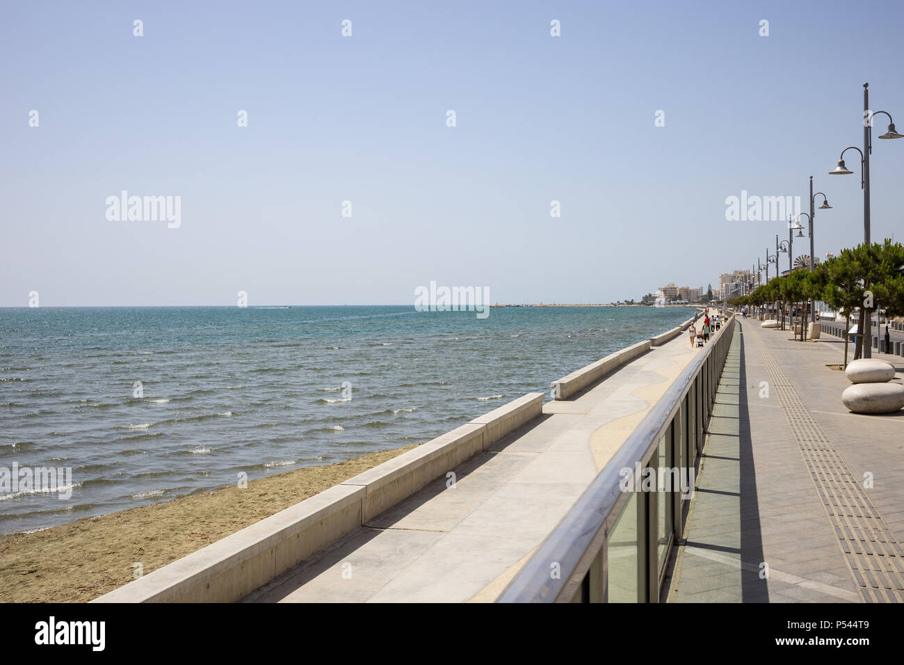 Cyprus, Larnaca city. Stone path for promenade around the sea. Harbor ...