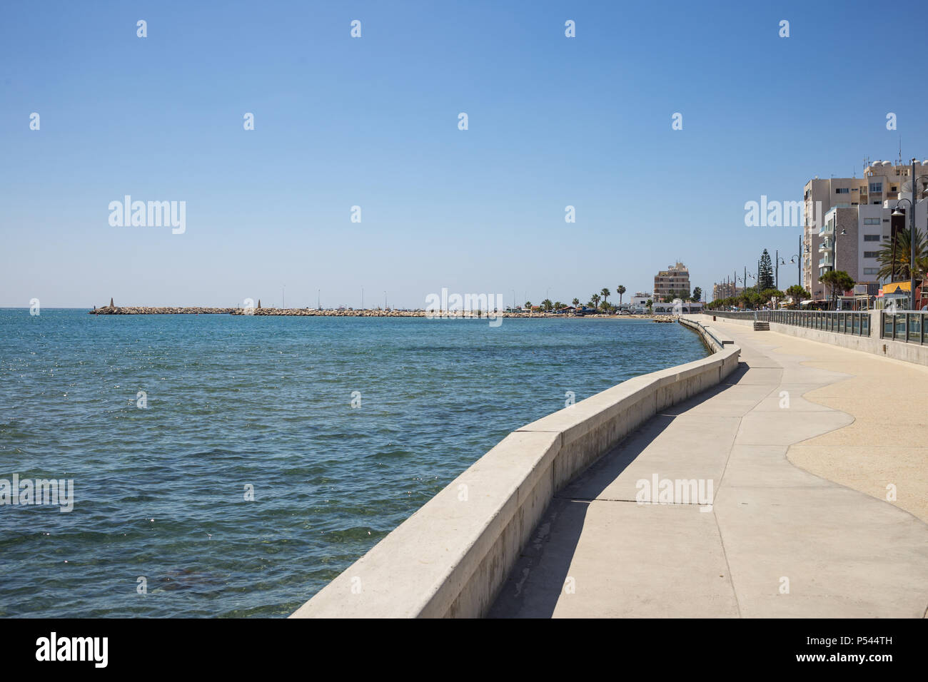 Cyprus, Larnaca city. Stone path around and above the sea. Harbor ...