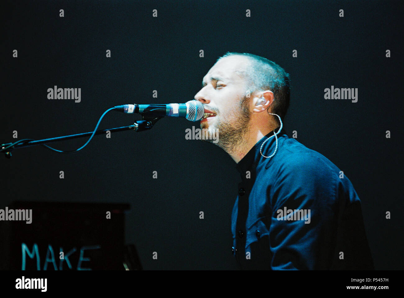 Chris Martin lead singer in Coldplay performing at the Hollywood Bowl ...