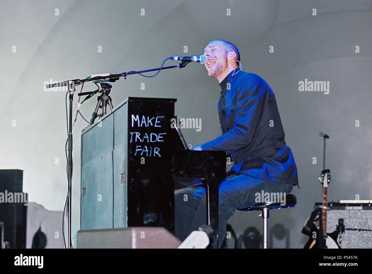 Chris Martin lead singer in Coldplay performing at the Hollywood Bowl ...
