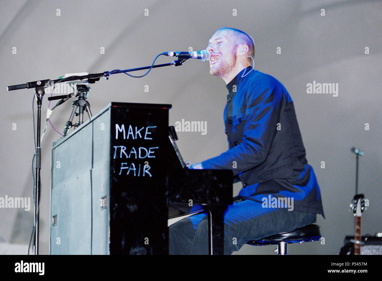 Chris Martin lead singer in Coldplay performing at the Hollywood Bowl ...