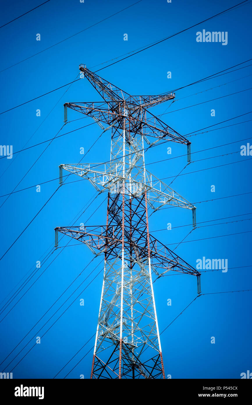 an image of a metal tower of Power Lines Stock Photo - Alamy