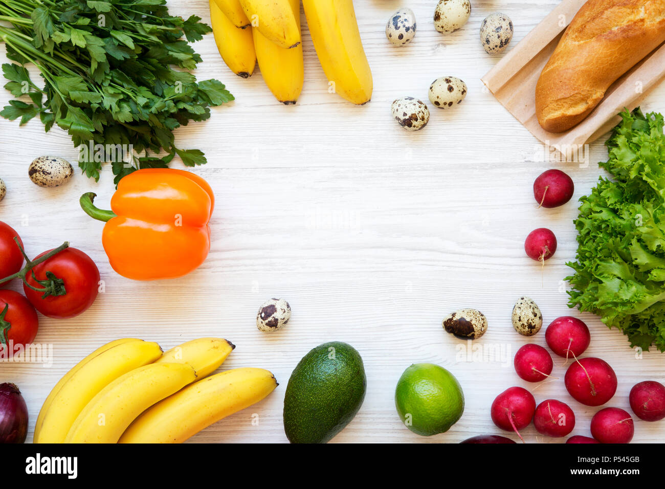 Frame of health food on a white wooden background. Healthy eating. Top ...