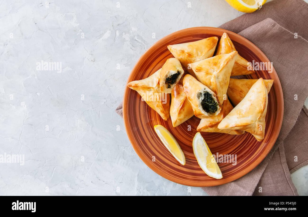 Arabic and middle eastern food concept. Fatayer sabanekh - traditional ...