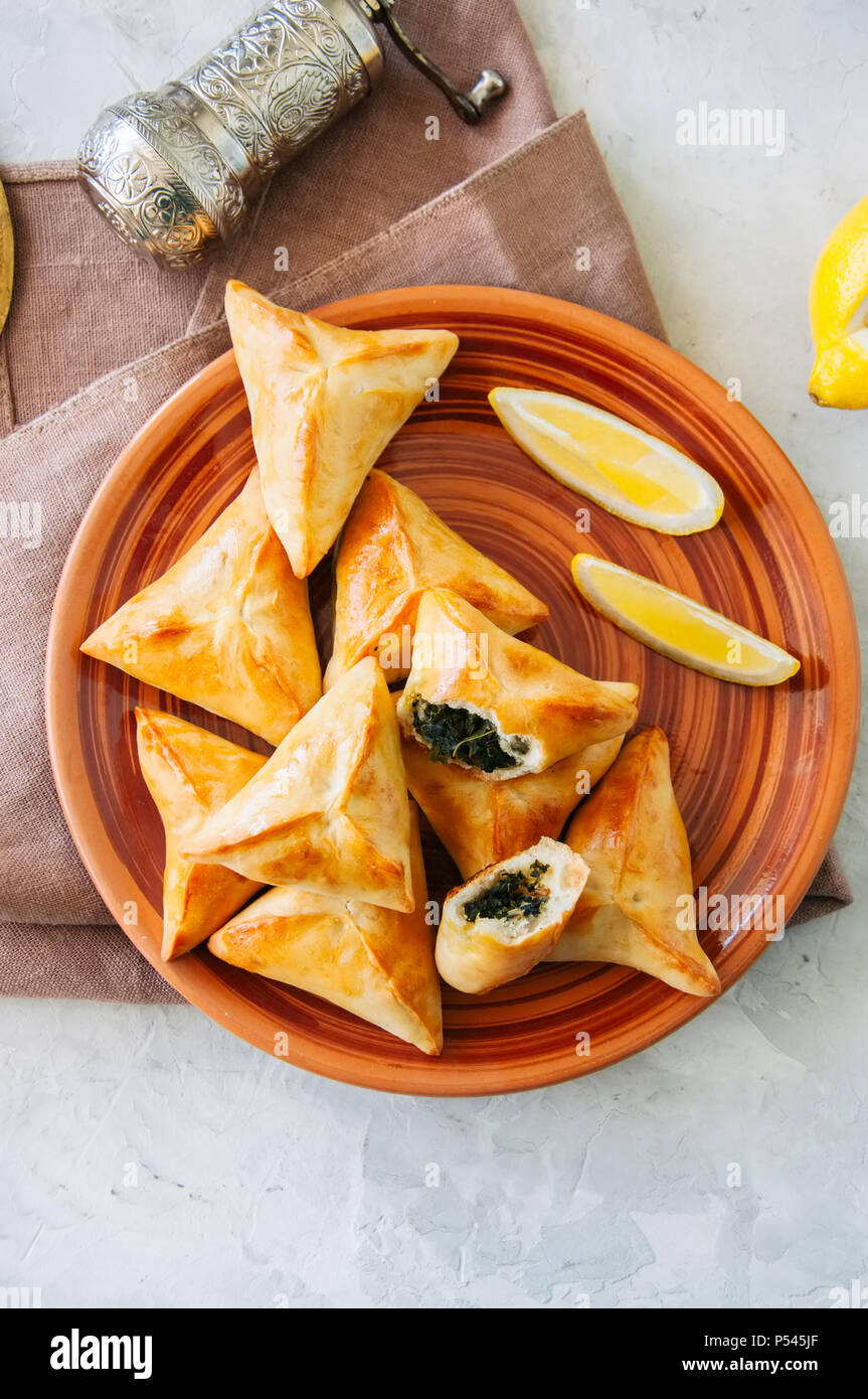 Arabic and middle eastern food concept. Fatayer sabanekh - traditional ...