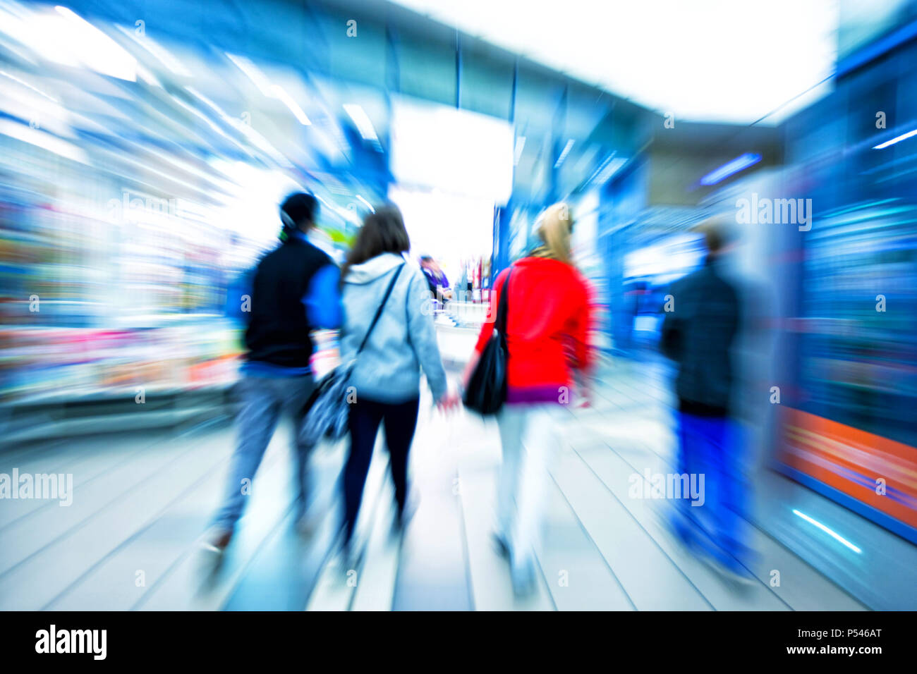 A shopper walking past a store window Stock Photo - Alamy