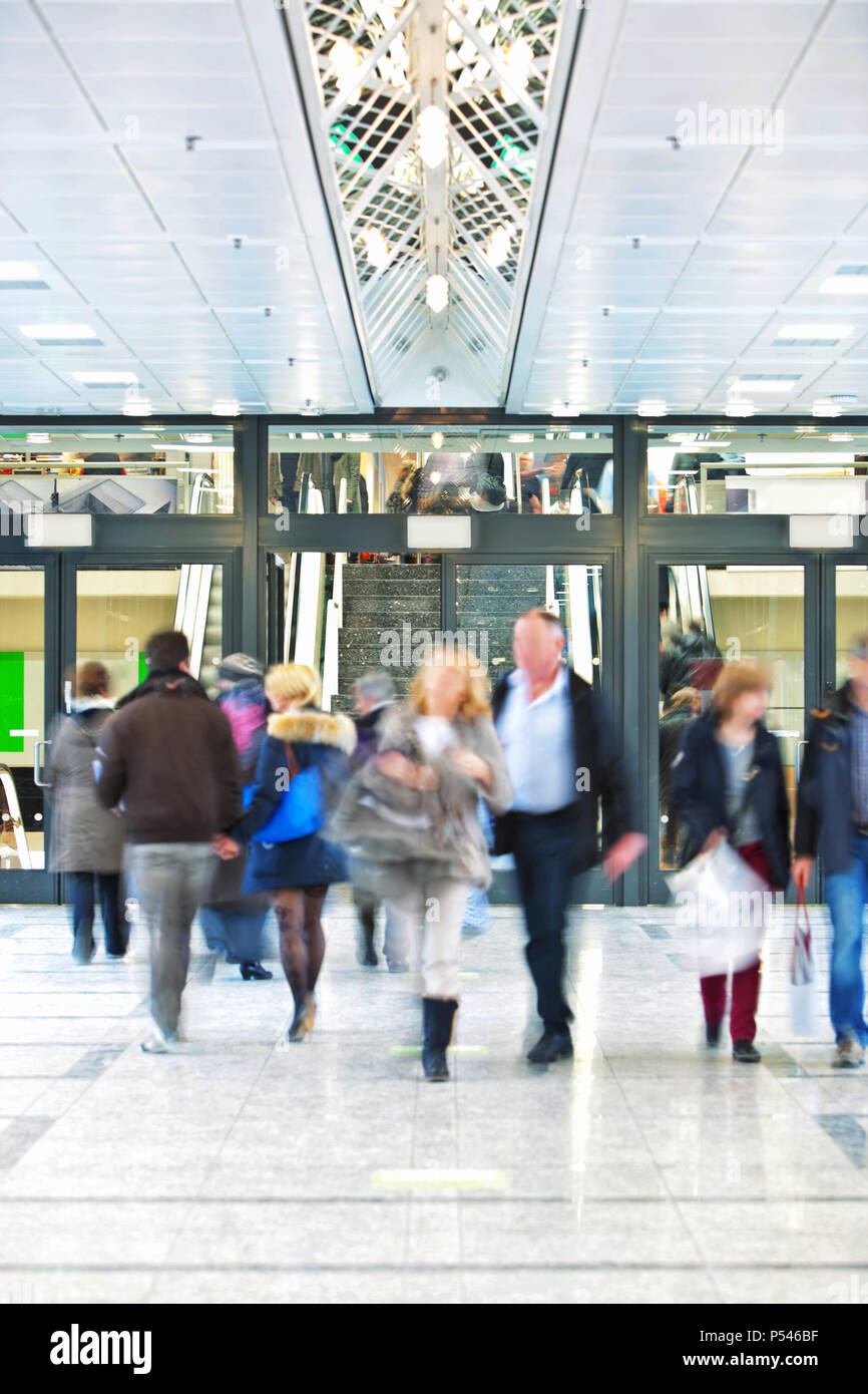 Businesseople Rushing in Office Building, Motion Blur Stock Photo - Alamy