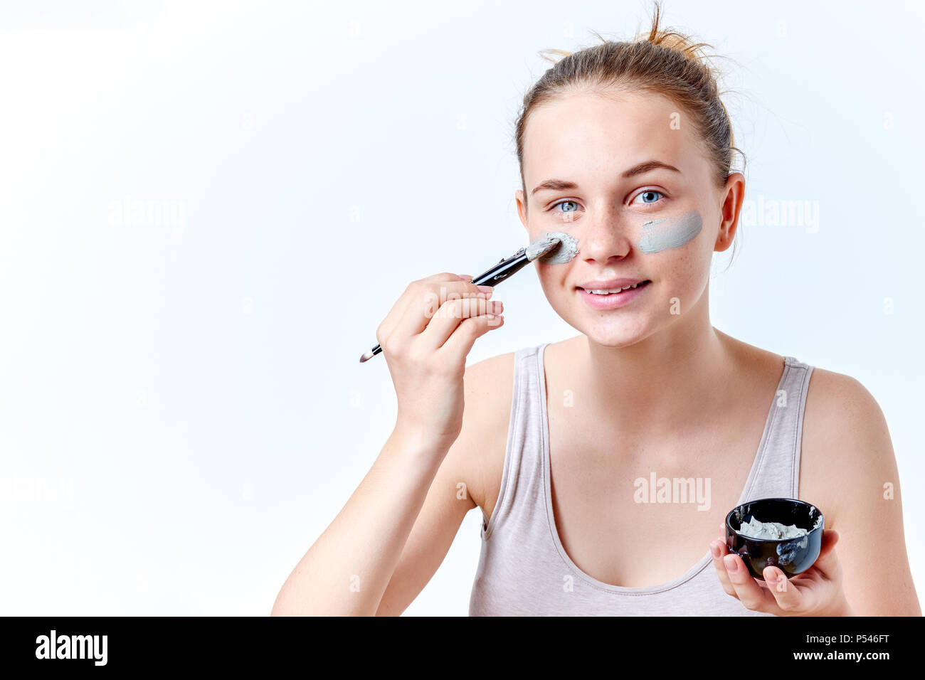 People, beauty, spa, cosmetology and skincare concept. Young teenage ...