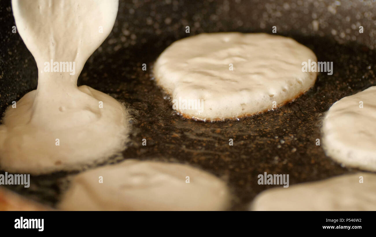 Slow motion pouring pancake mixture hi-res stock photography and images ...