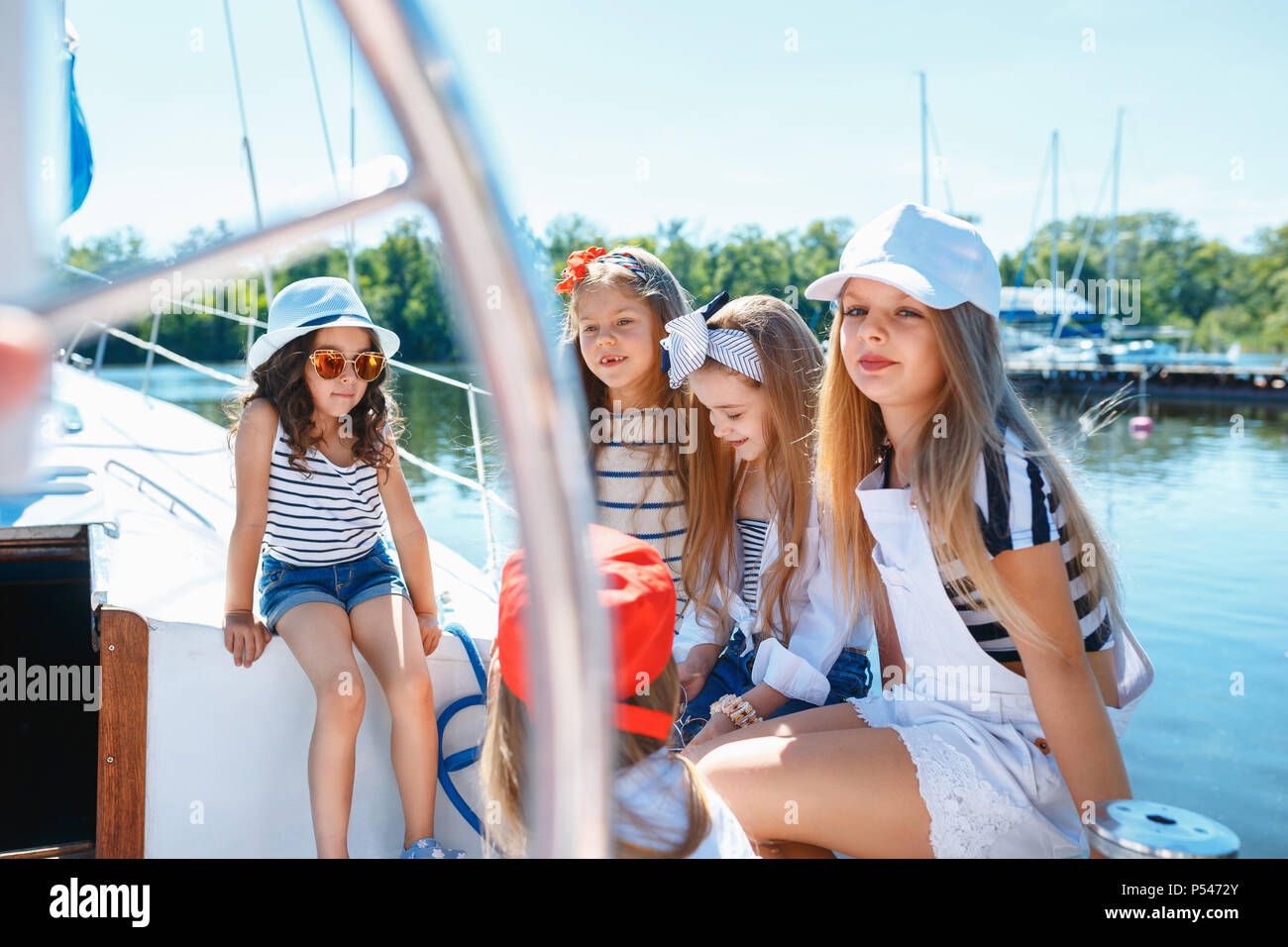 The children on board of sea yacht Stock Photo - Alamy