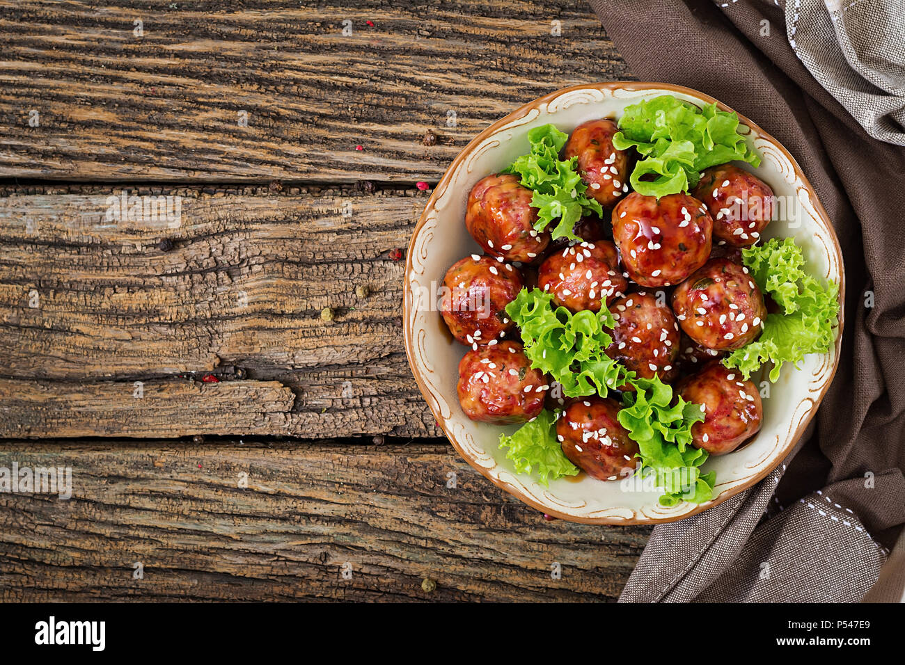 Meatballs with beef in sweet and sour sauce. Asian food. Top view. Flat ...