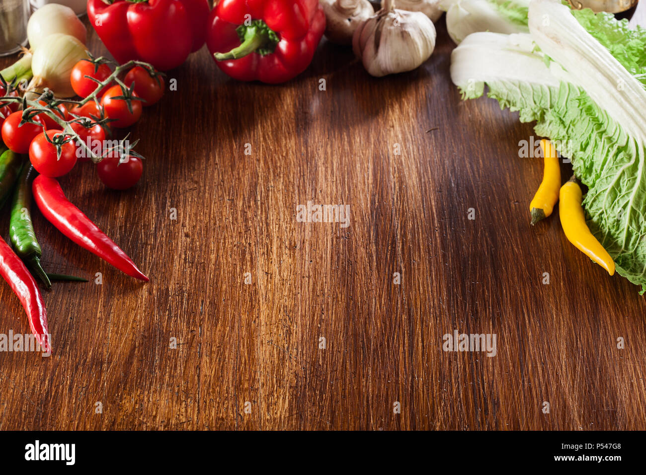 Fresh vegetable borders on wooden background with copy space Stock ...