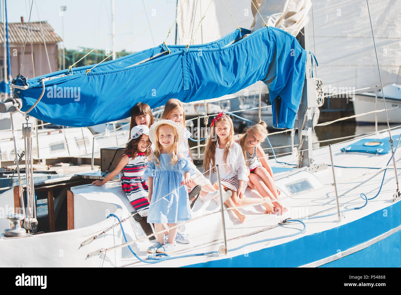 The children on board of sea yacht Stock Photo - Alamy