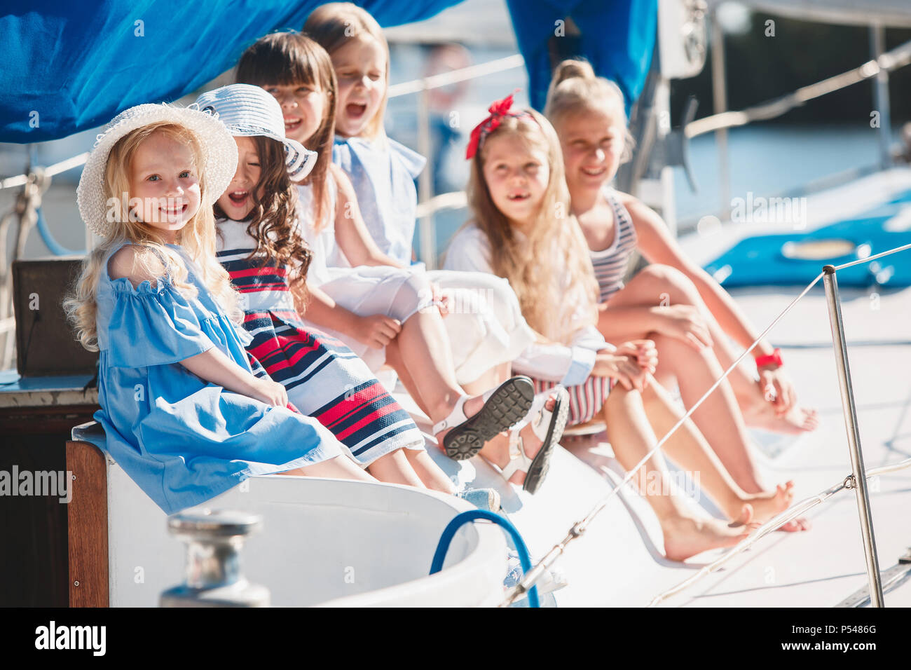 The children on board of sea yacht Stock Photo - Alamy
