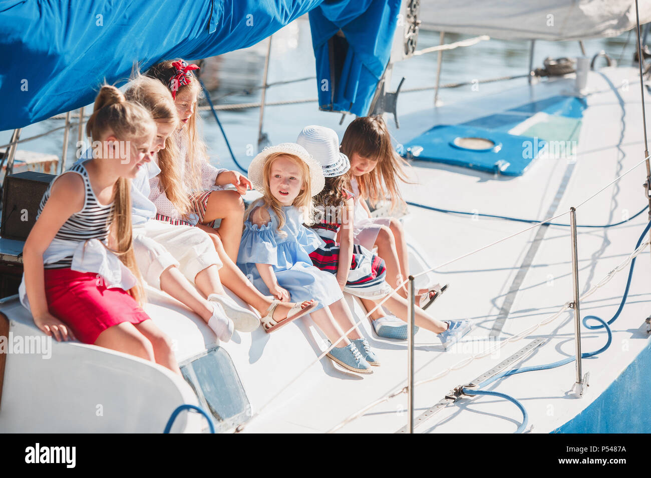 The children on board of sea yacht Stock Photo - Alamy