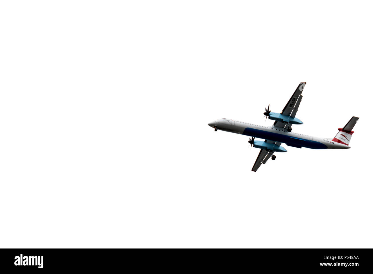 A plane flying over the sky Stock Photo - Alamy