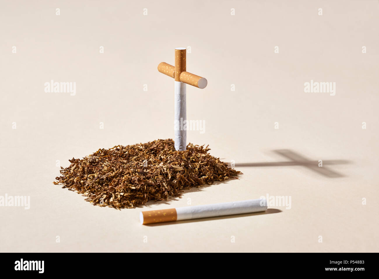 Tobacco grave with cigarette cross Stock Photo - Alamy