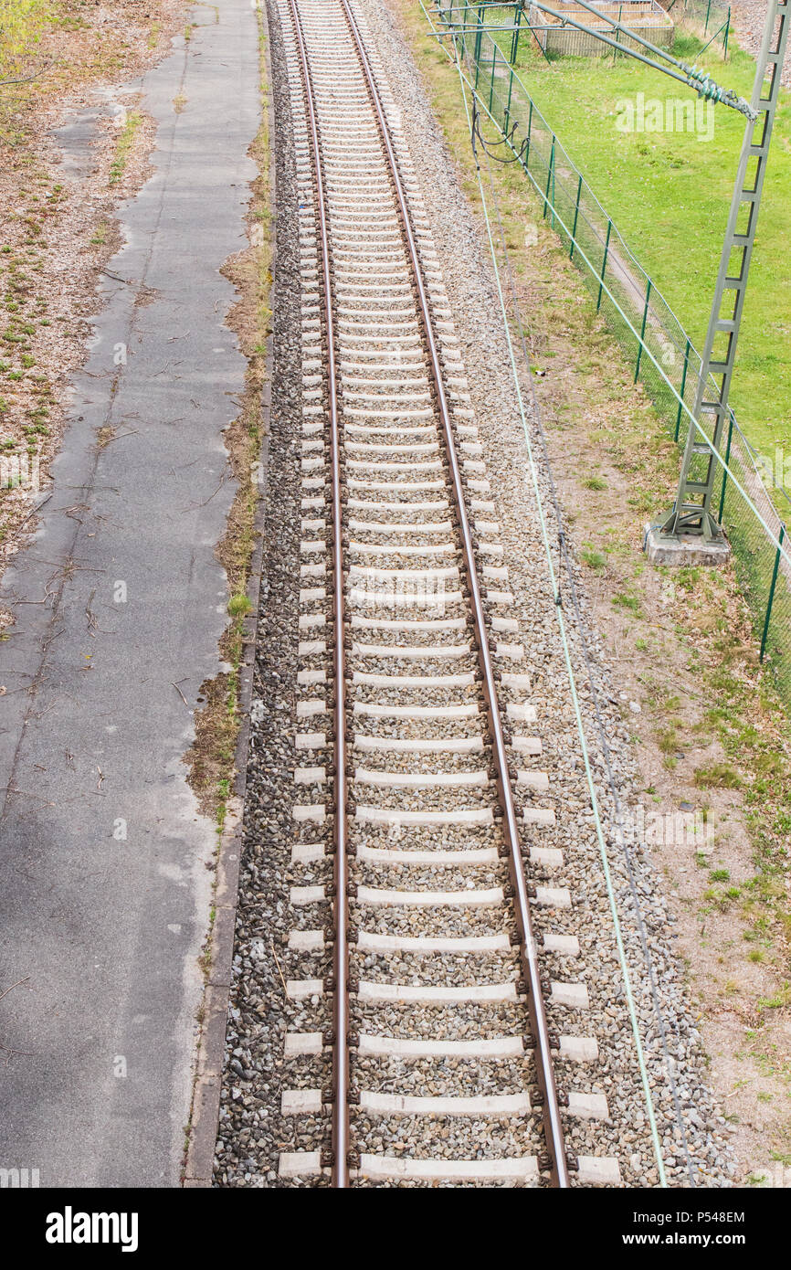 The way forward railway with daylight Stock Photo - Alamy