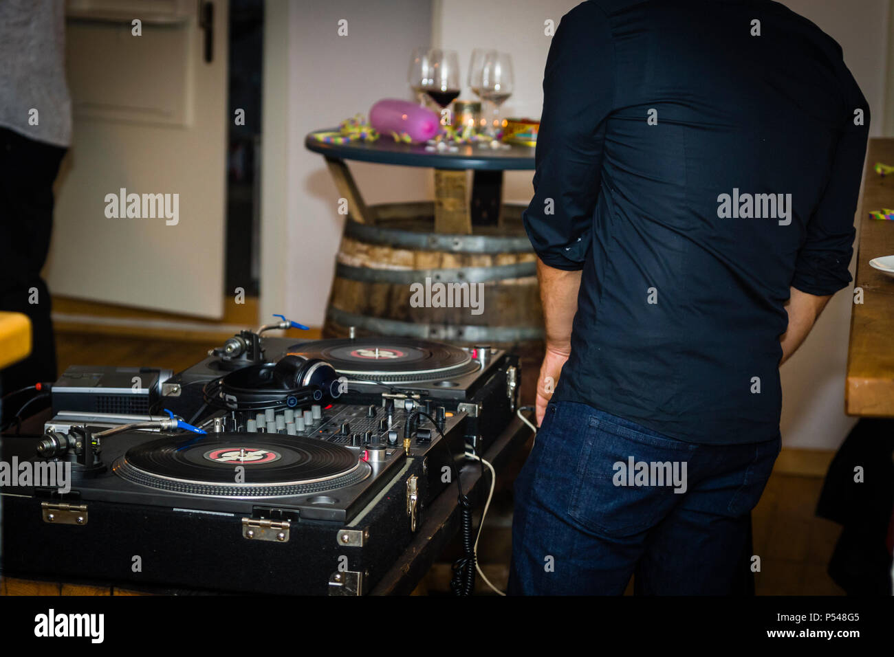DJ was playing music with vinyl Stock Photo - Alamy