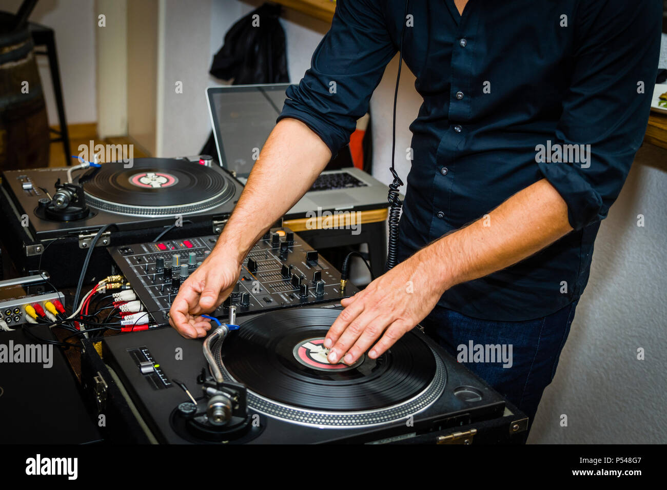 DJ was playing music with vinyl Stock Photo - Alamy