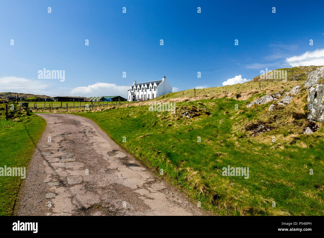 An isolated whitewashed cottage just off the 'main road' on the ...