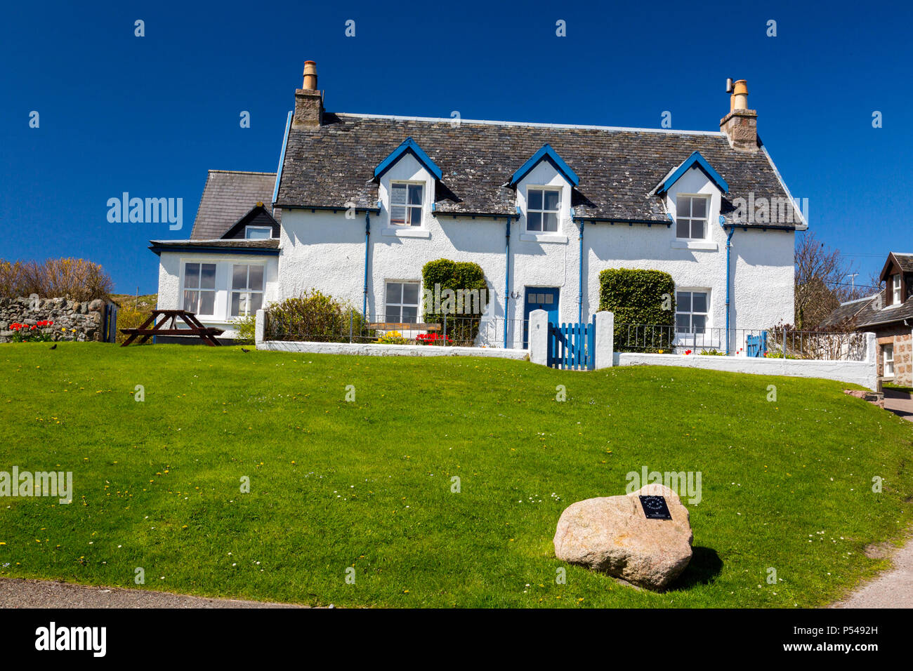 A colourful cottage at Baile Mor, the largest settlement on the ...