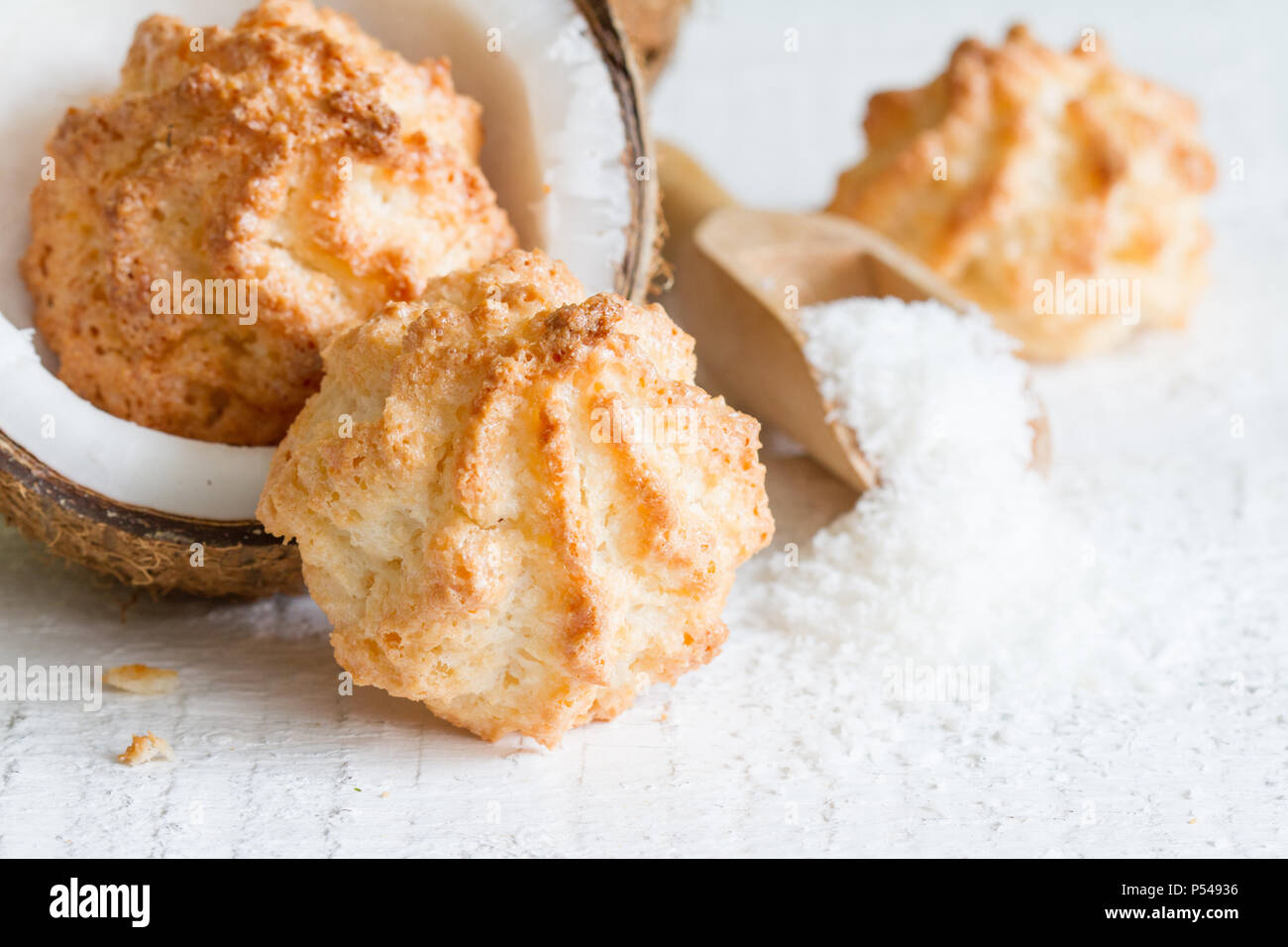 Coconut cookies on white background with fresh copra Stock Photo - Alamy