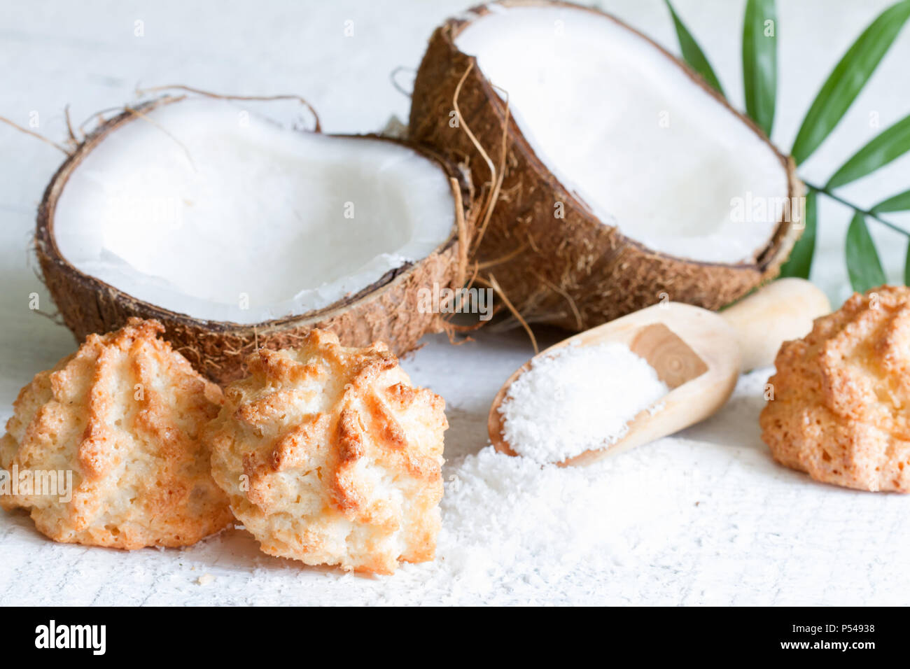 Coconut cookies on white background with fresh copra Stock Photo - Alamy