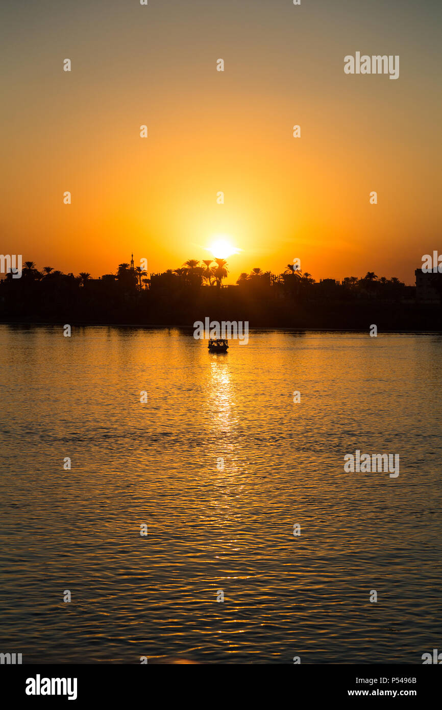 Sunset on the Nile River with Felucca boat sailing, Luxor, Egypt ...